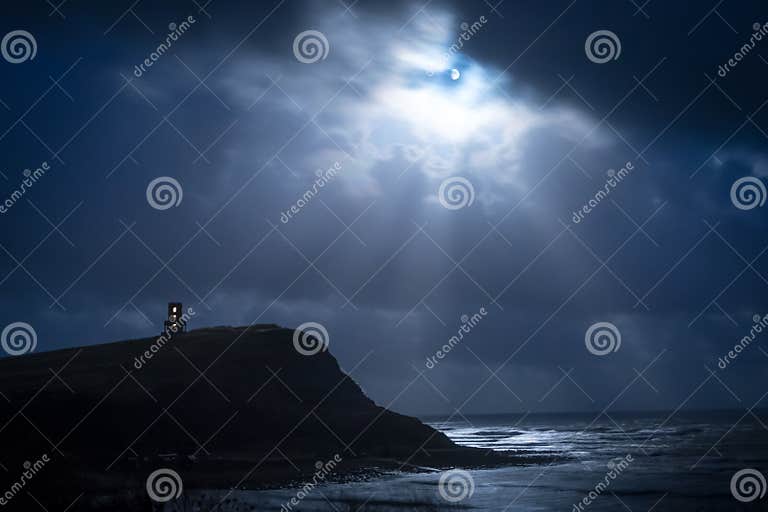 Lighthouse Cliff Moonlight and Clouds in the Sky Stock Image - Image of ...