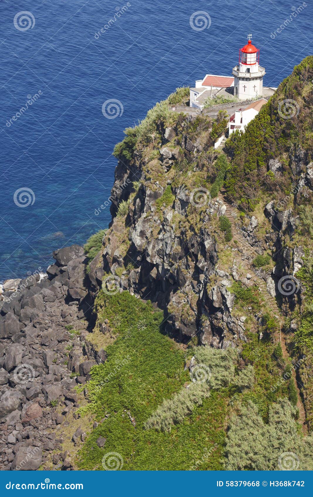 Lighthouse, Cliff and Atlantic Ocean in Ponta Do Arnel, Azores Stock ...