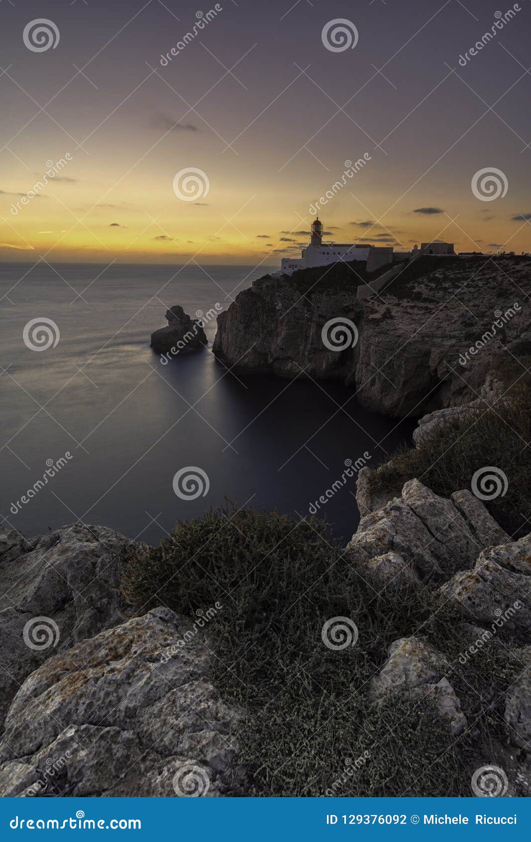 Lighthouse cliff sunset stock photo. Image of nature - 129376092