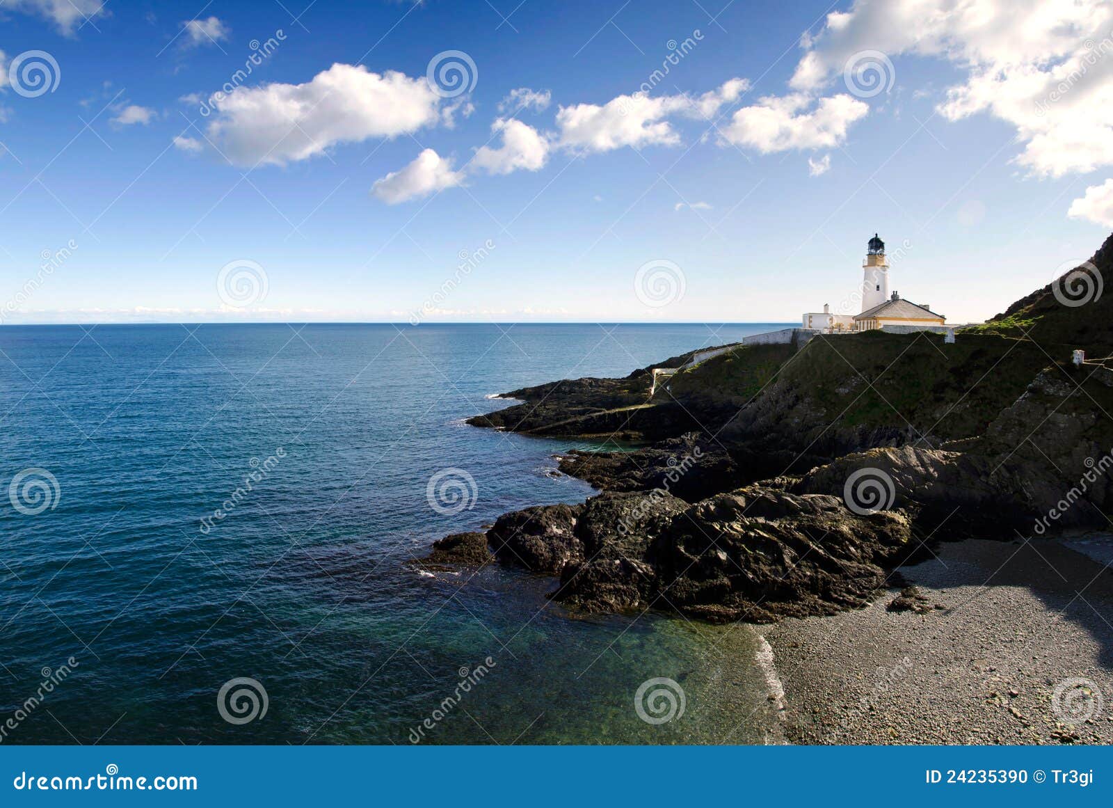Lighthouse on Cliffs with Beach and Sea Stock Photo - Image of ...