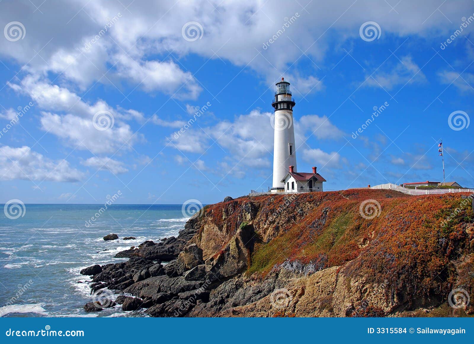 Lighthouse on a Cloudy Day stock photo. Image of shore - 3315584
