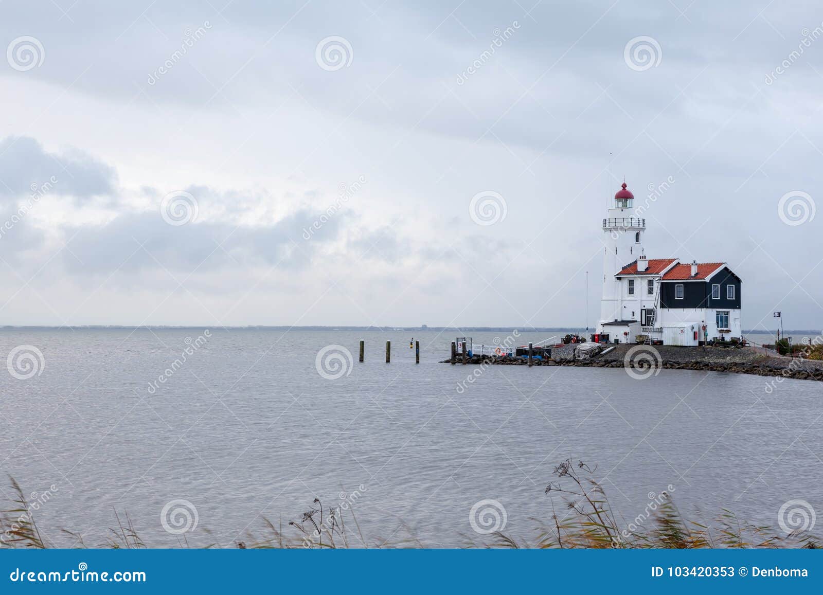 Lighthouse on a cloudy day stock image. Image of england - 103420353