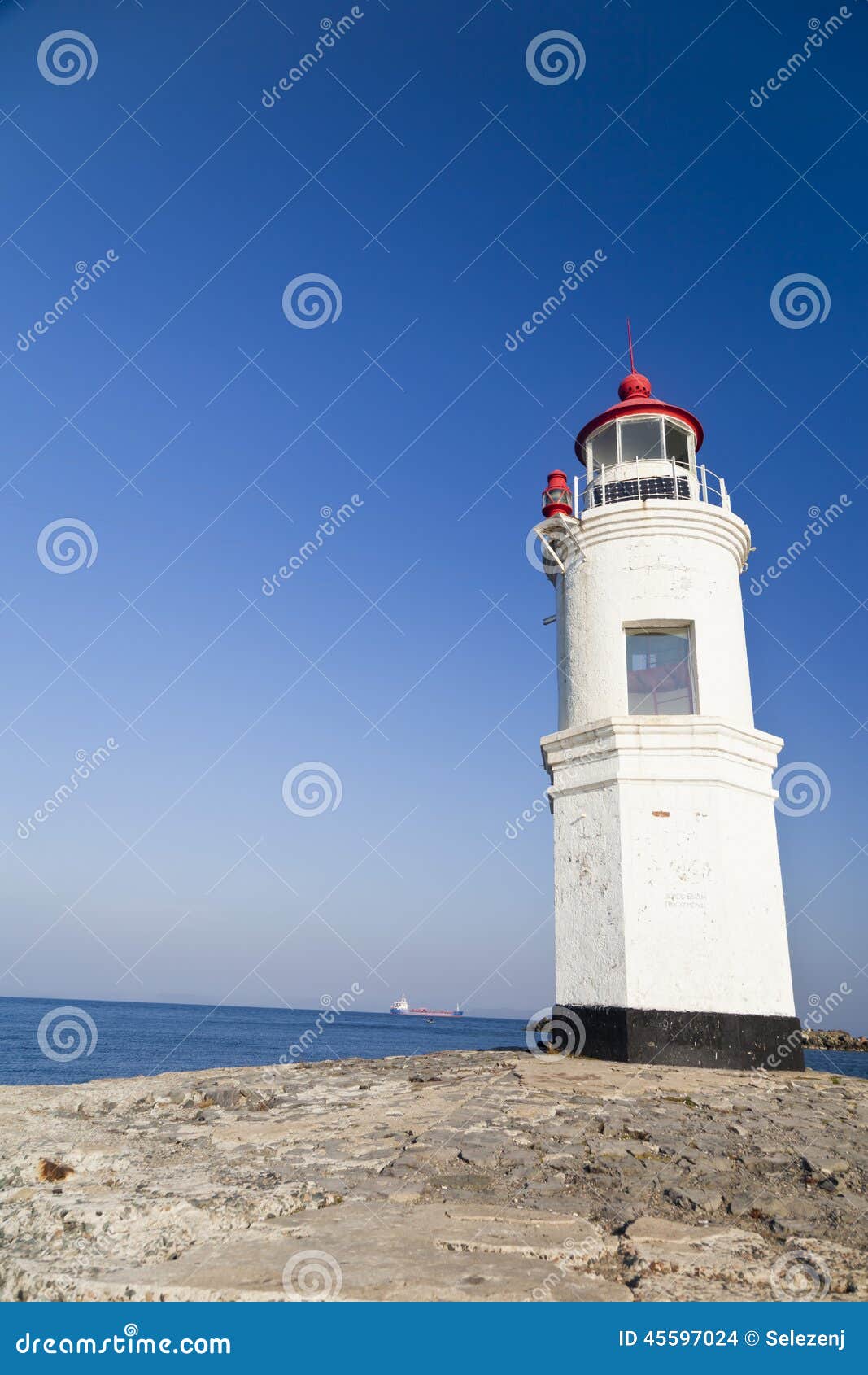 Lighthouse on the coast stock photo. Image of historic - 45597024