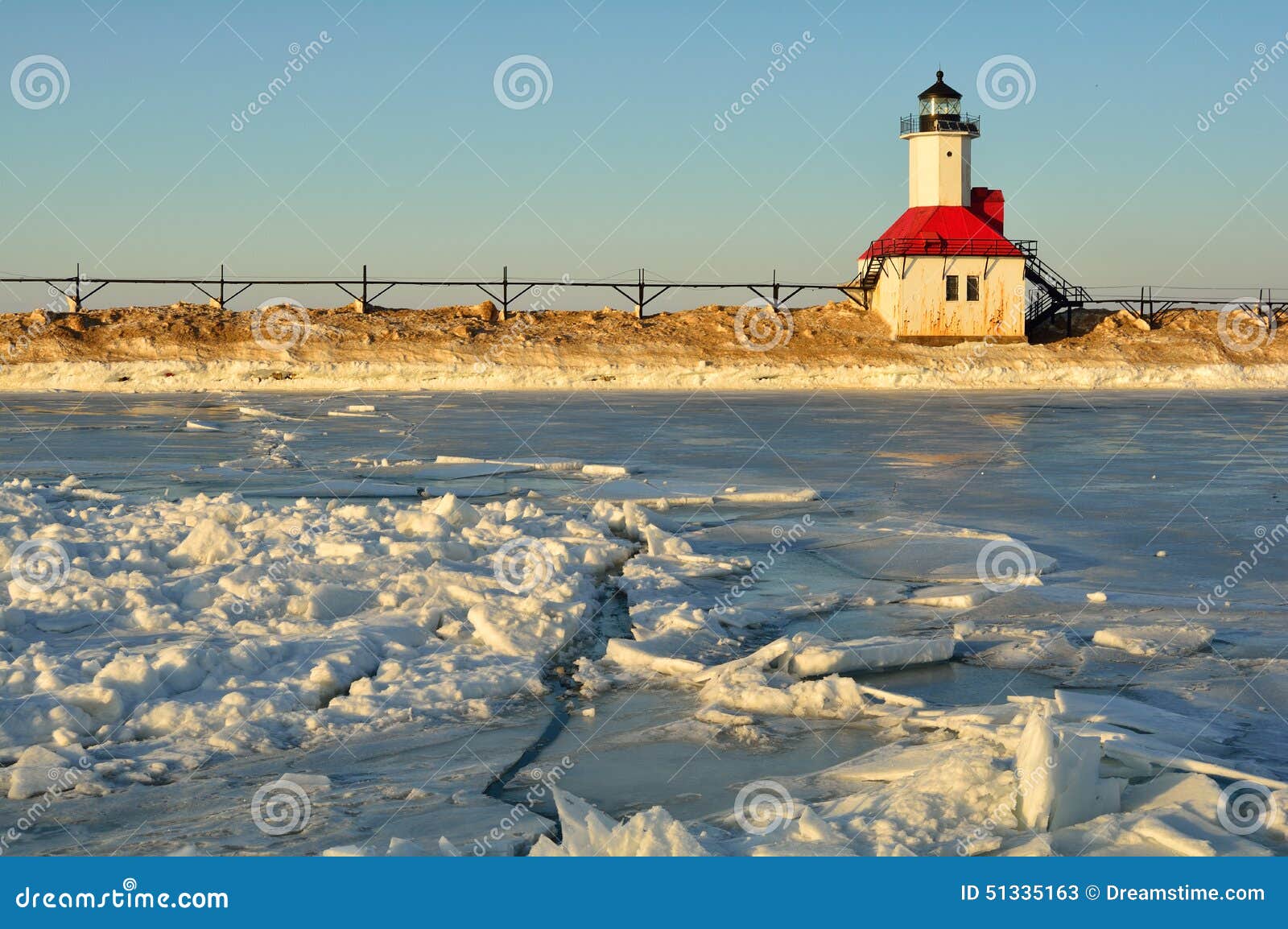 Lighthouse with Cracked Ice Stock Image - Image of heaped, water: 51335163