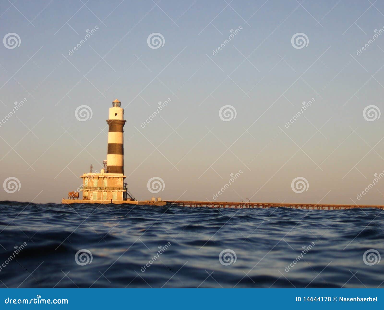 Lighthouse at Daedalus Reef Stock Photo - Image of striped, pier: 14644178