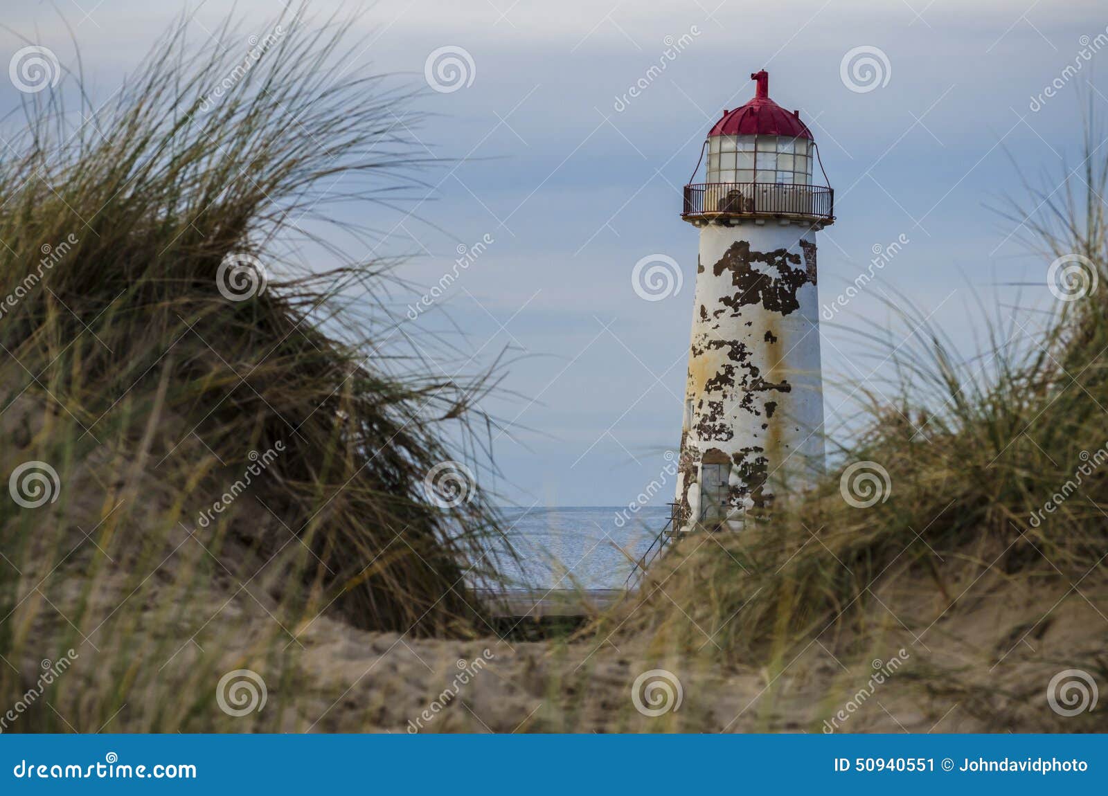 Lighthouse through the Dunes Stock Image - Image of landmark, nature ...