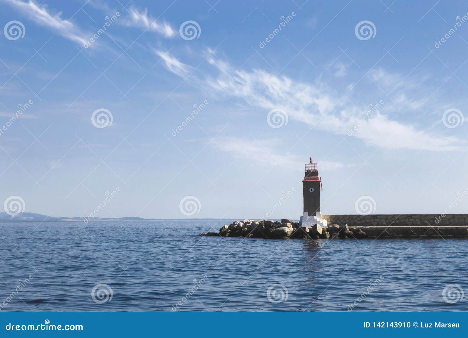 Lighthouse at the End of the Dock Stock Photo - Image of waves ...