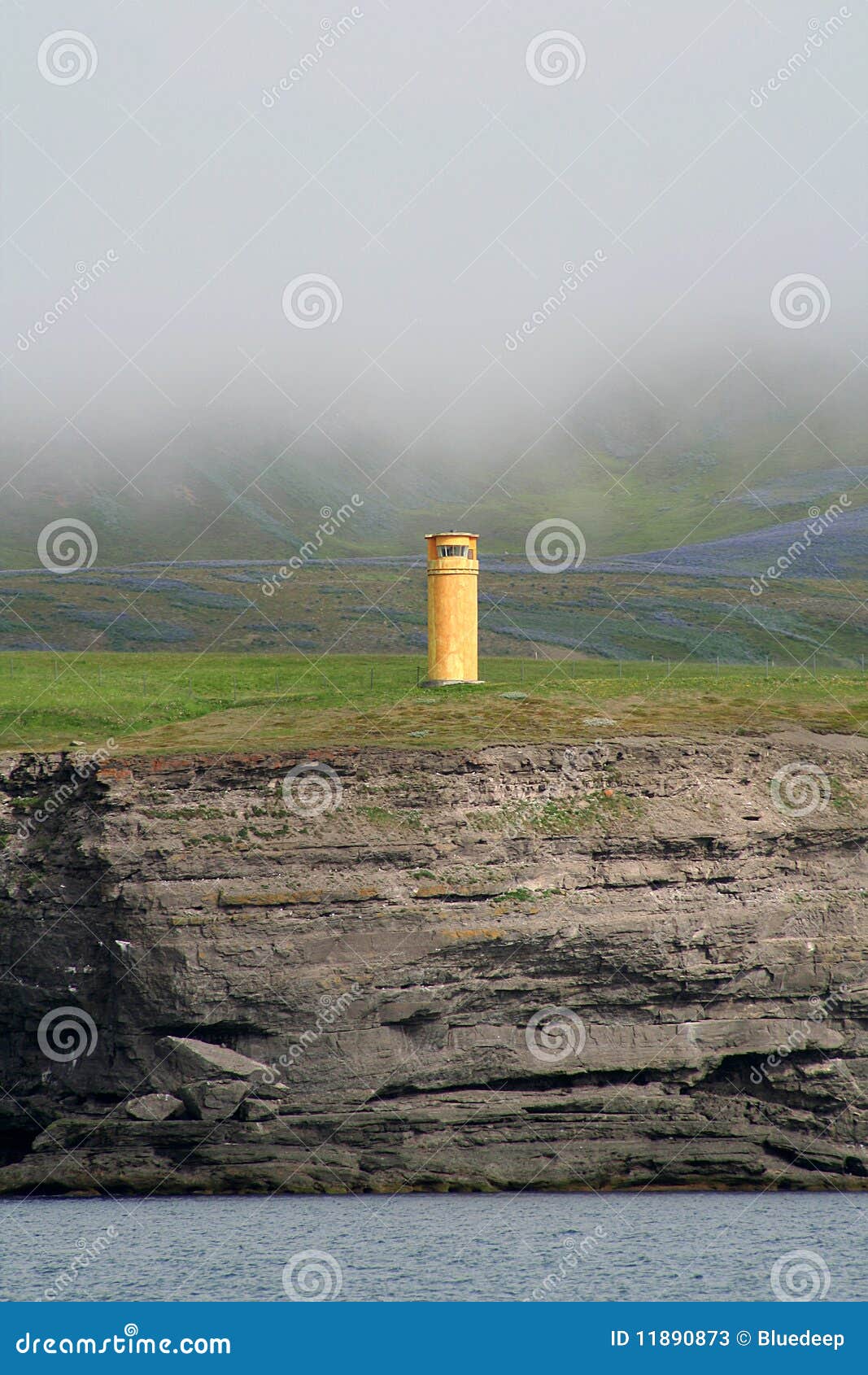 Lighthouse in the fog stock image. Image of rock, coastline - 11890873