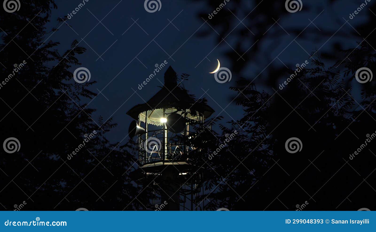 Lighthouse in the Forest at Night with the Moon in the Sky Stock Image ...
