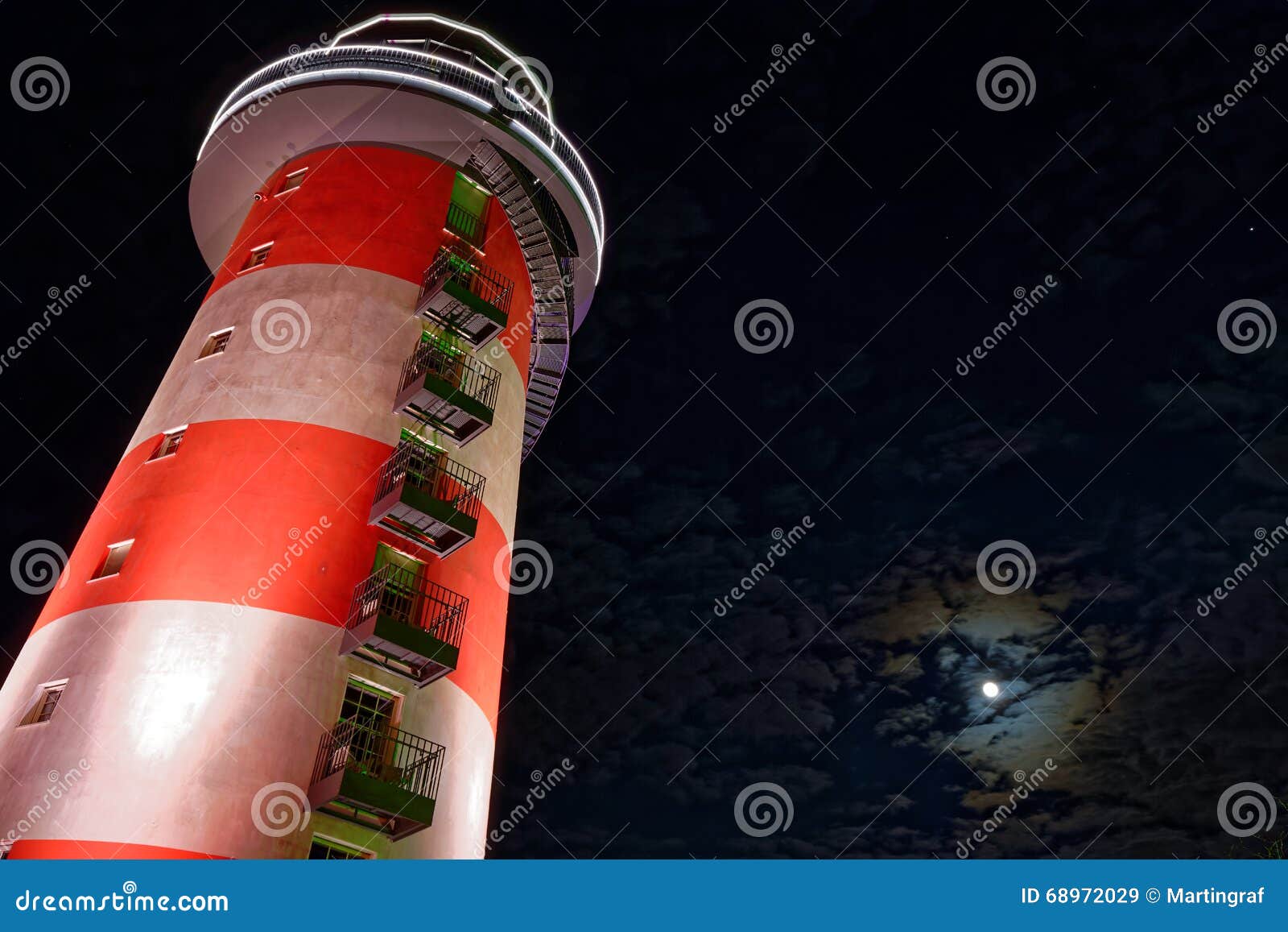 Lighted Lighthouse Against Dark Sky by Full Moon Low-angle Stock Image ...
