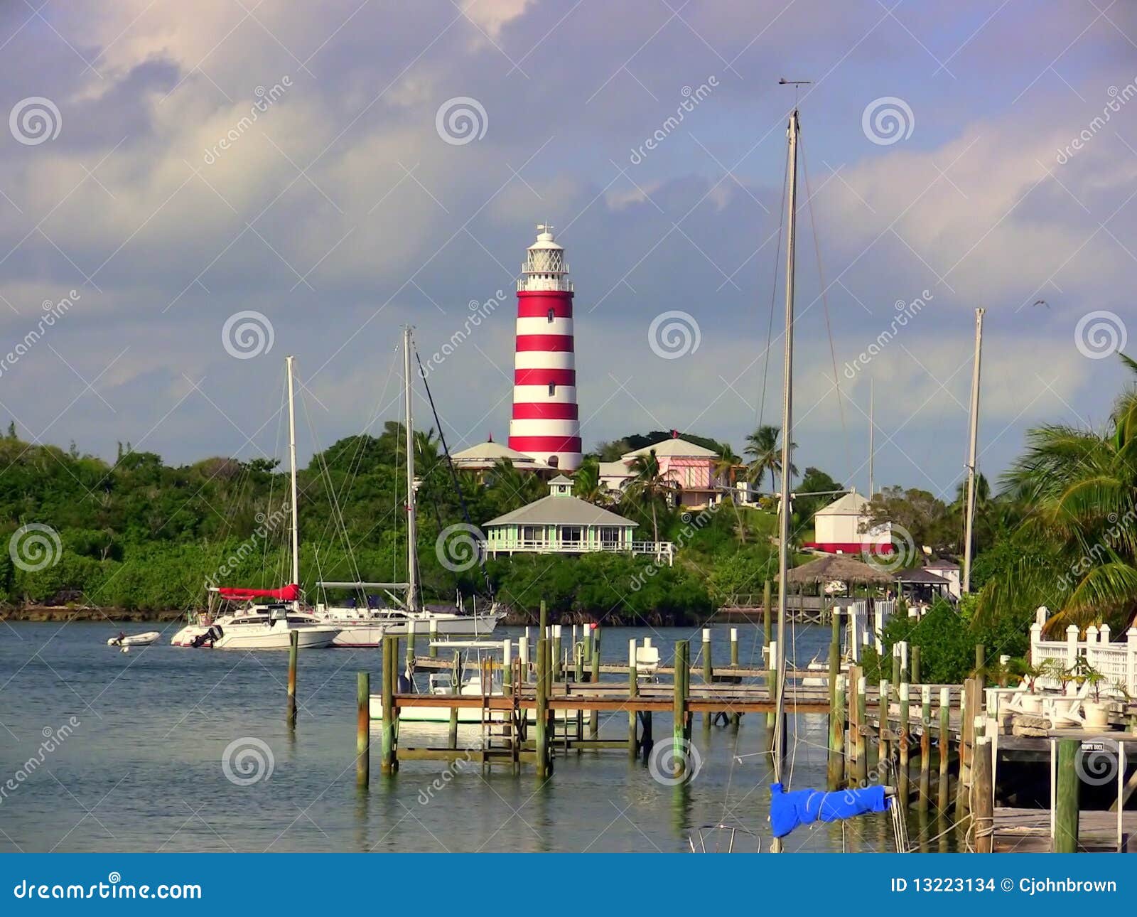 Lighthouse Harbor stock photo. Image of boats, tropical - 13223134