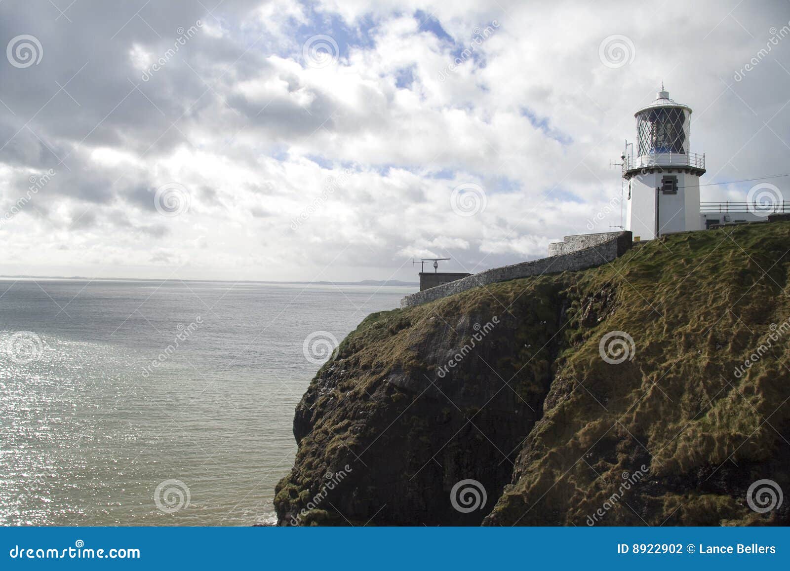 Lighthouse on high rocks stock photo. Image of coastal - 8922902