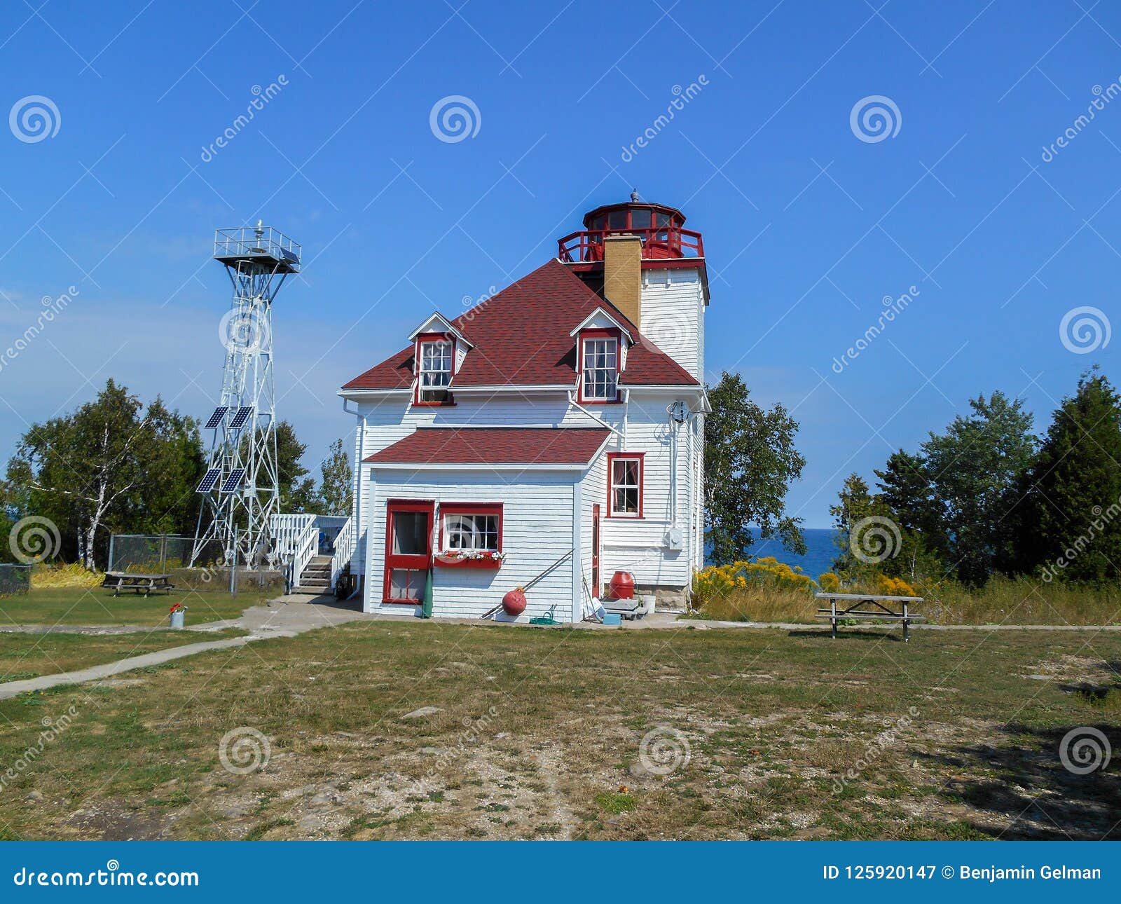 Lighthouse on the shore stock image. Image of ocean - 125920147