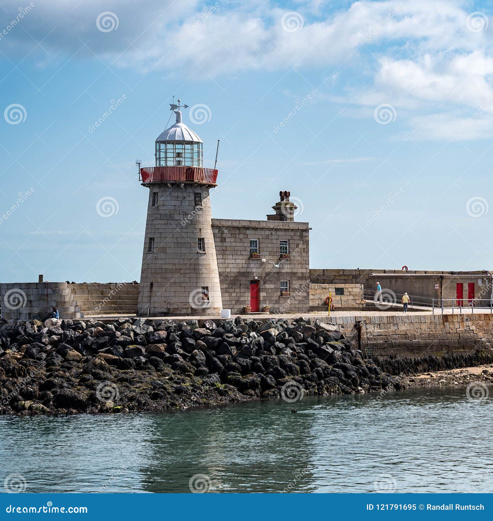 Lighthouse in Howth Harbor stock image. Image of dramatic - 121791695