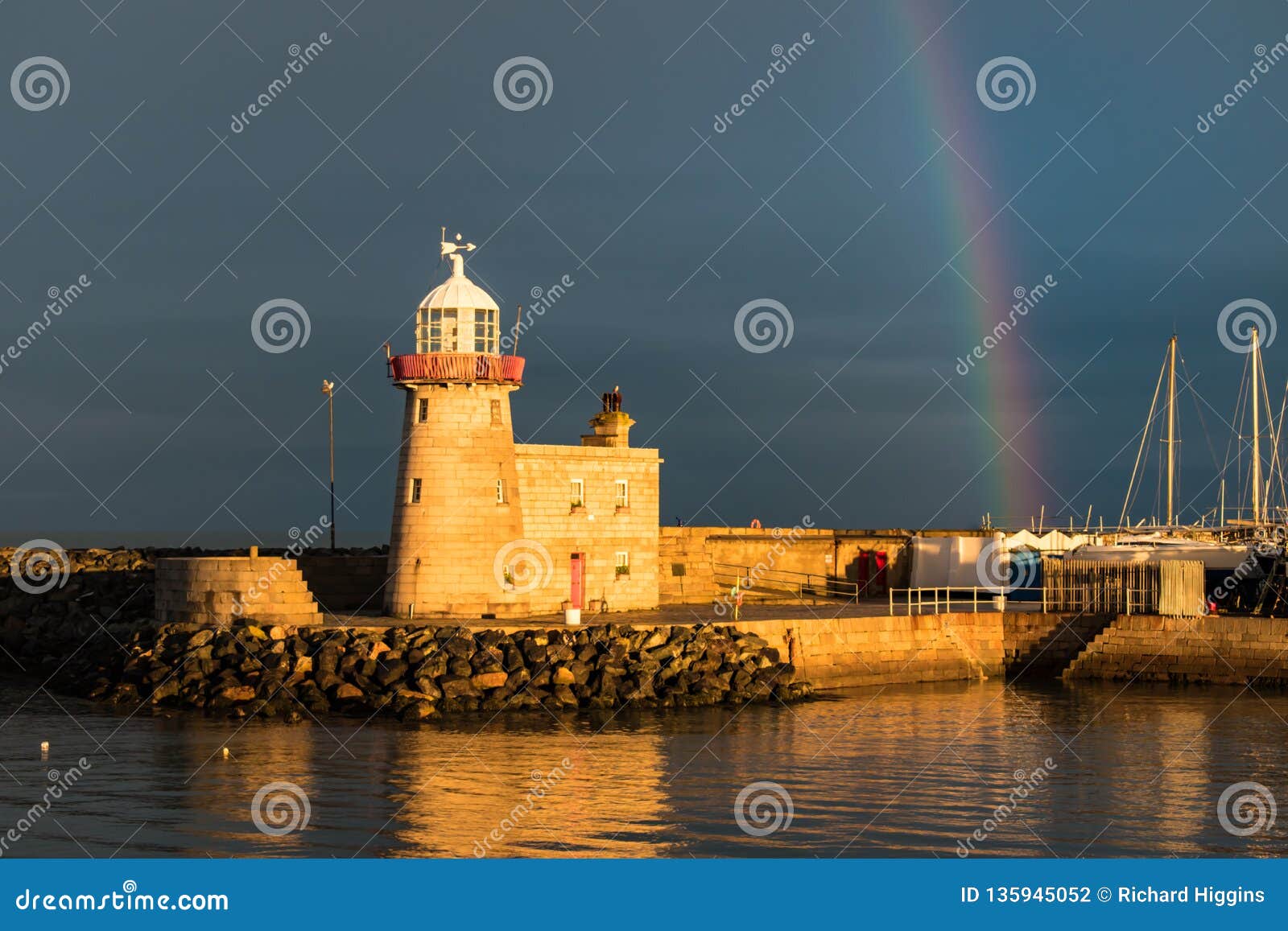 The Lighthouse at Howth Harbour in County Dublin Bathed in Sunlight ...