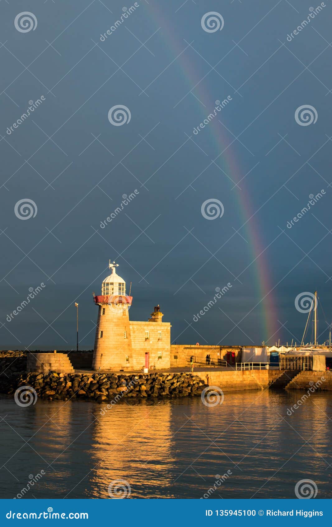 The Lighthouse at Howth Harbour in County Dublin Bathed in Sunlight ...