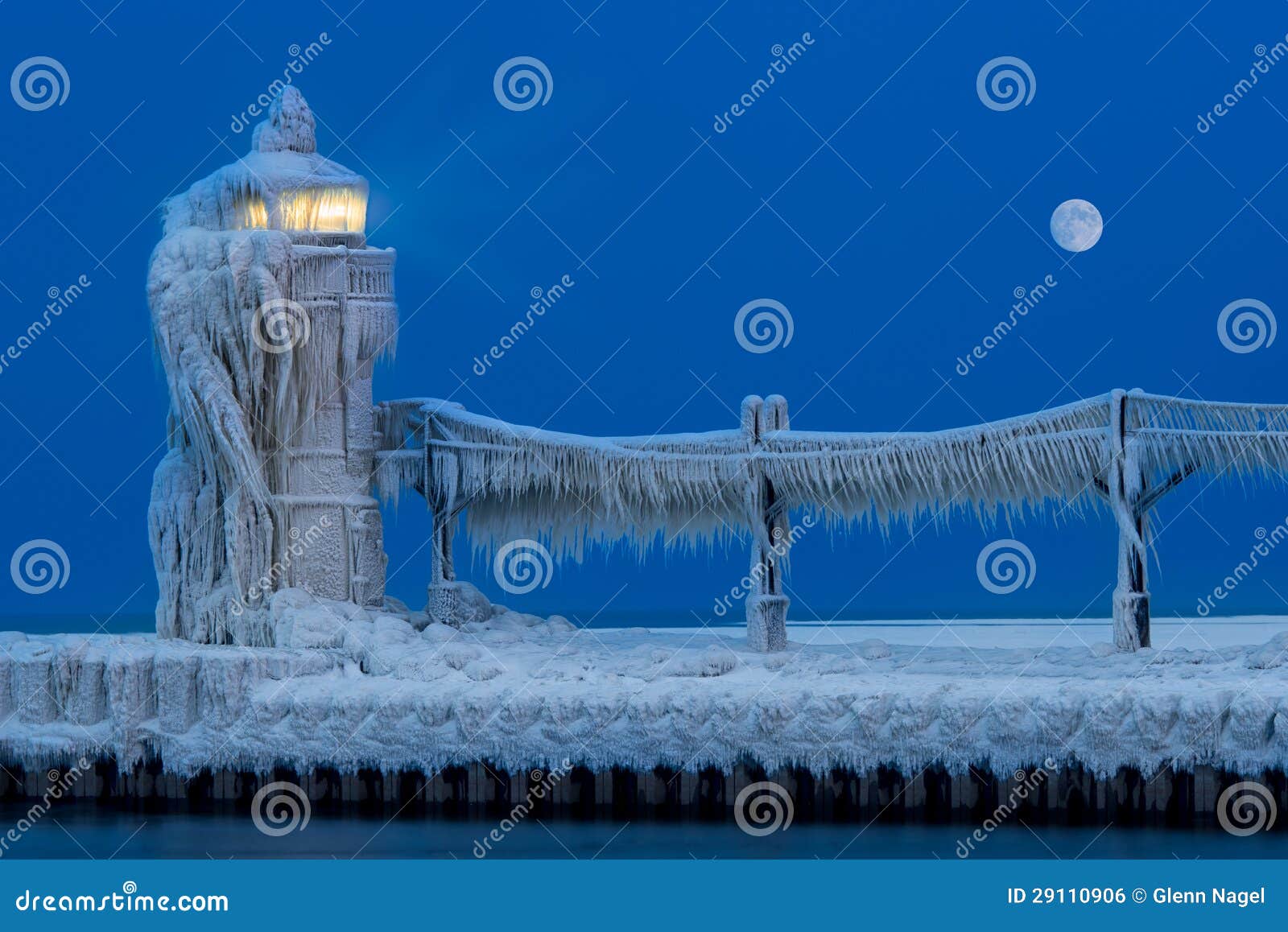 Lighthouse Ice Sculpture at Night Stock Photo - Image of lighthouse ...