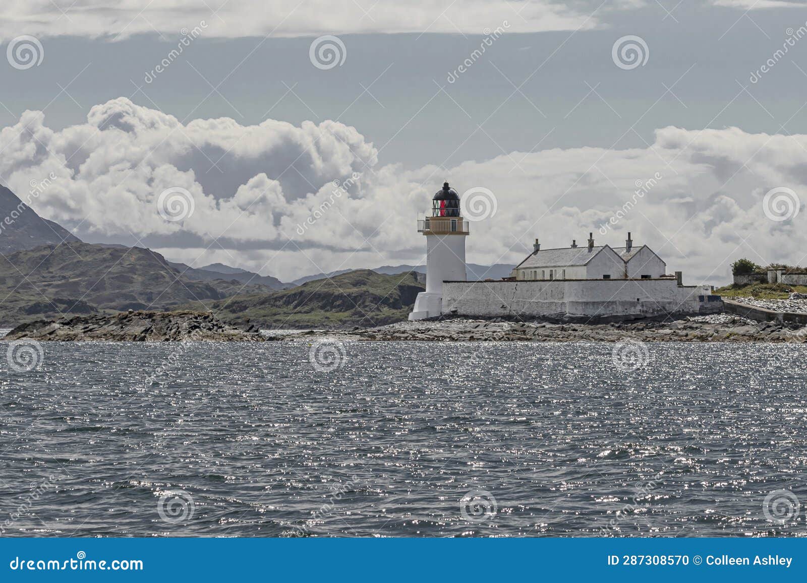 Lighthouse on an Island Off the Coast of Scotland Stock Photo - Image ...