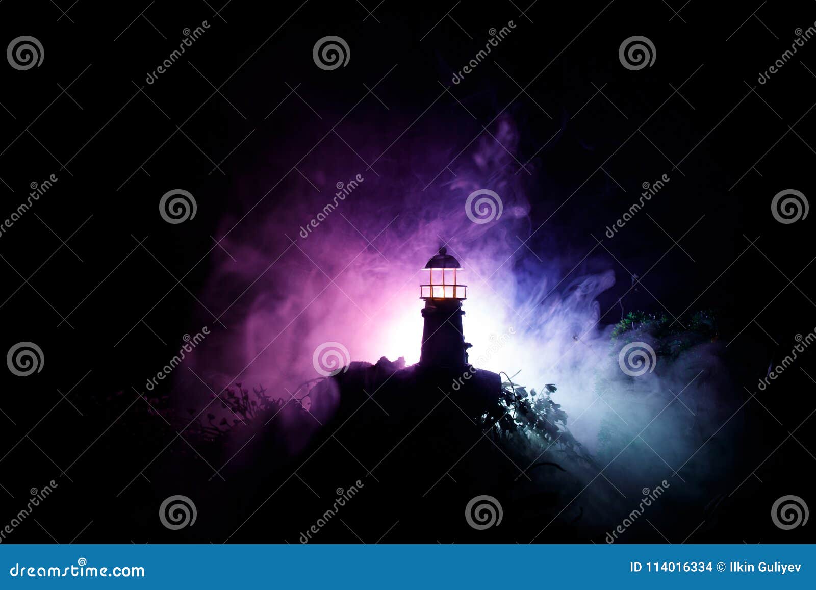 Lighthouse with Light Beam at Night with Fog. Old Lighthouse Standing ...