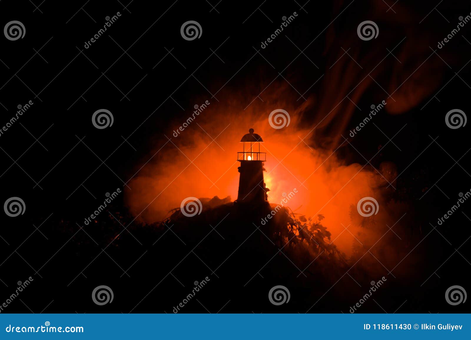 Lighthouse with Light Beam at Night with Fog. Old Lighthouse Standing ...