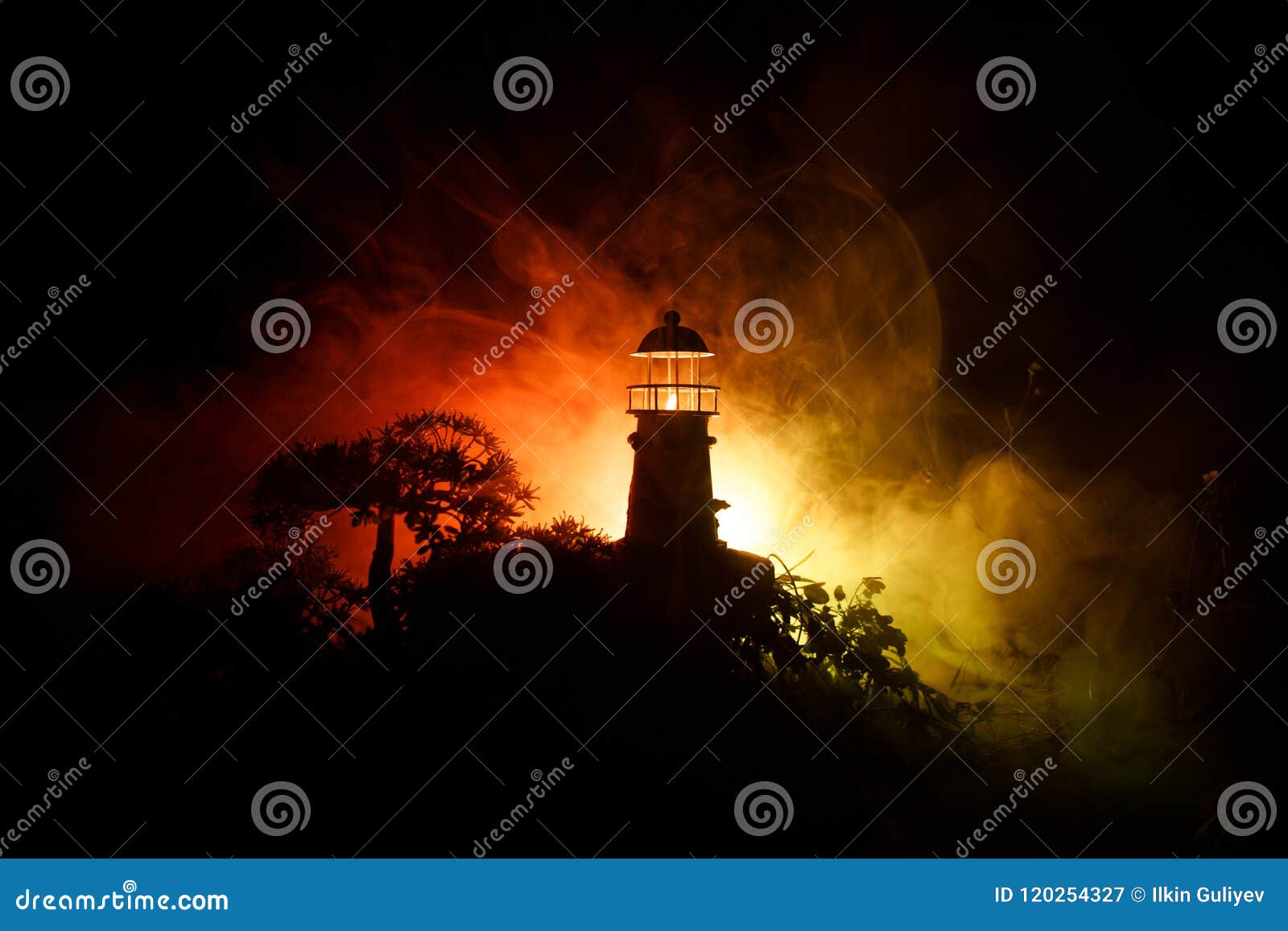 Lighthouse with Light Beam at Night with Fog. Old Lighthouse Standing ...