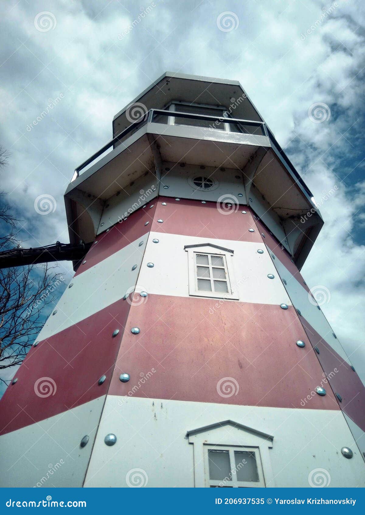 Lighthouse looking clouds stock image. Image of tower - 206937535