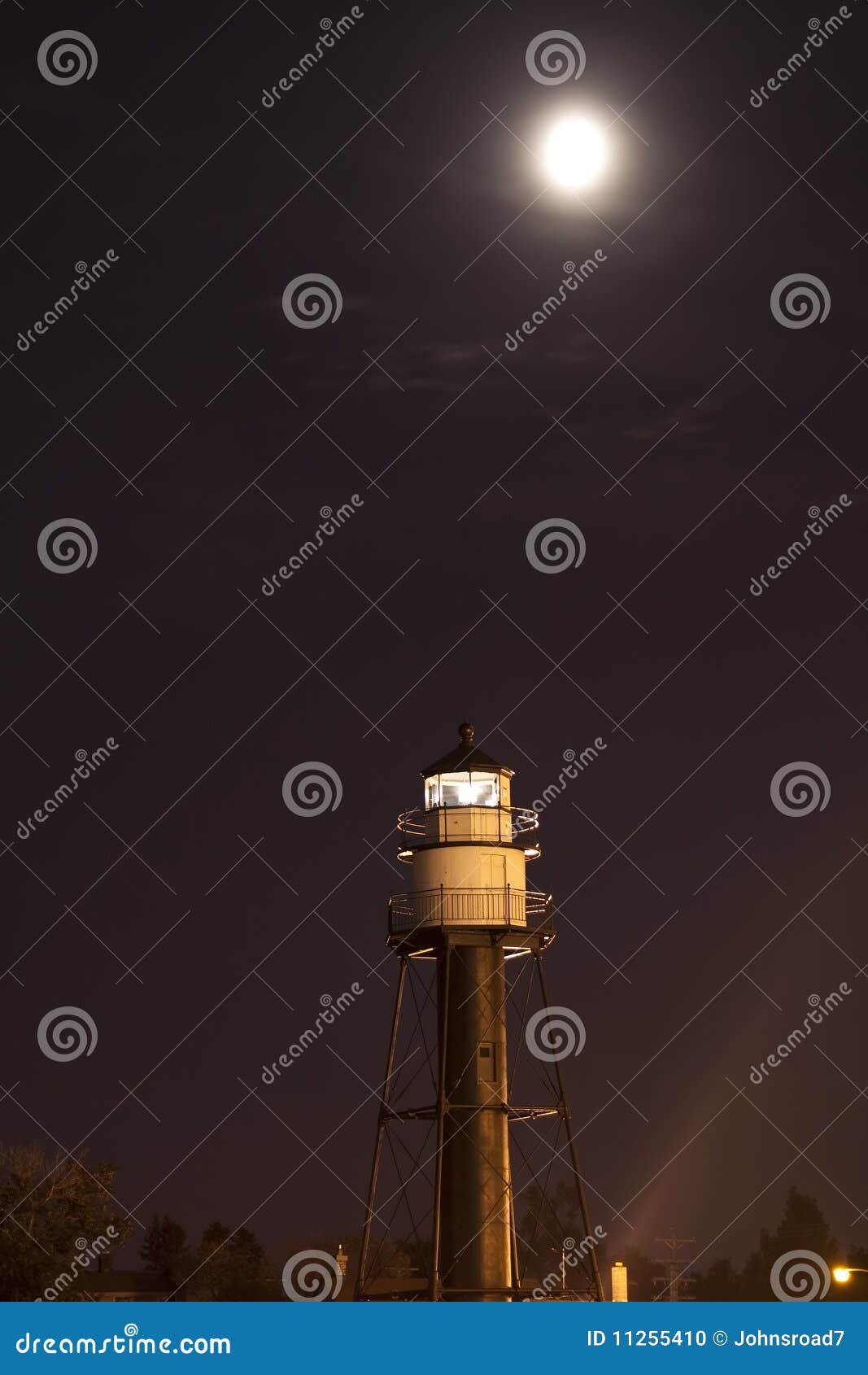 Lighthouse & Moon stock photo. Image of guidance - 11255410
