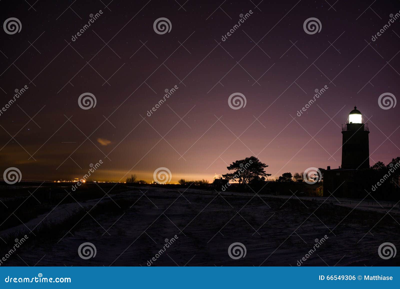 Lighthouse at night stock photo. Image of coast, lighthouse - 66549306