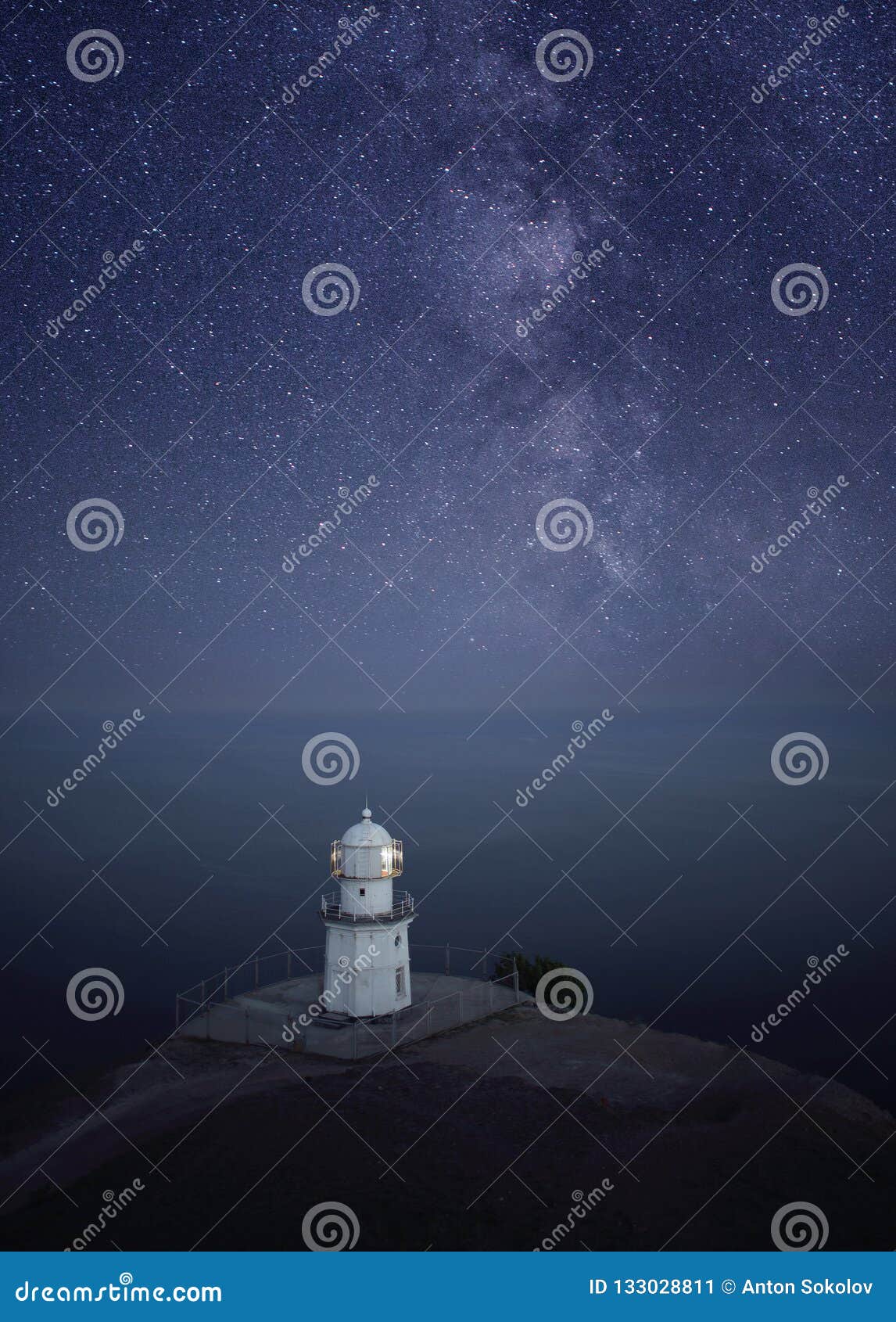 Lighthouse at night stock image. Image of lighthouse - 133028811