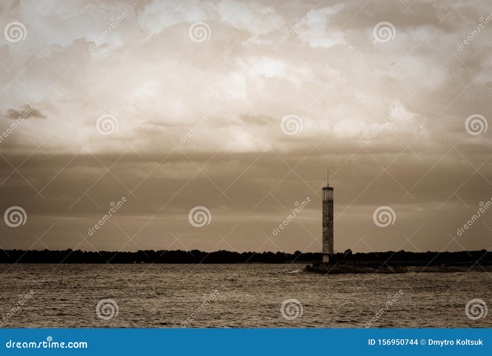 Lighthouse or Old Beacon Under Storm Clouds Stock Photo - Image of ...