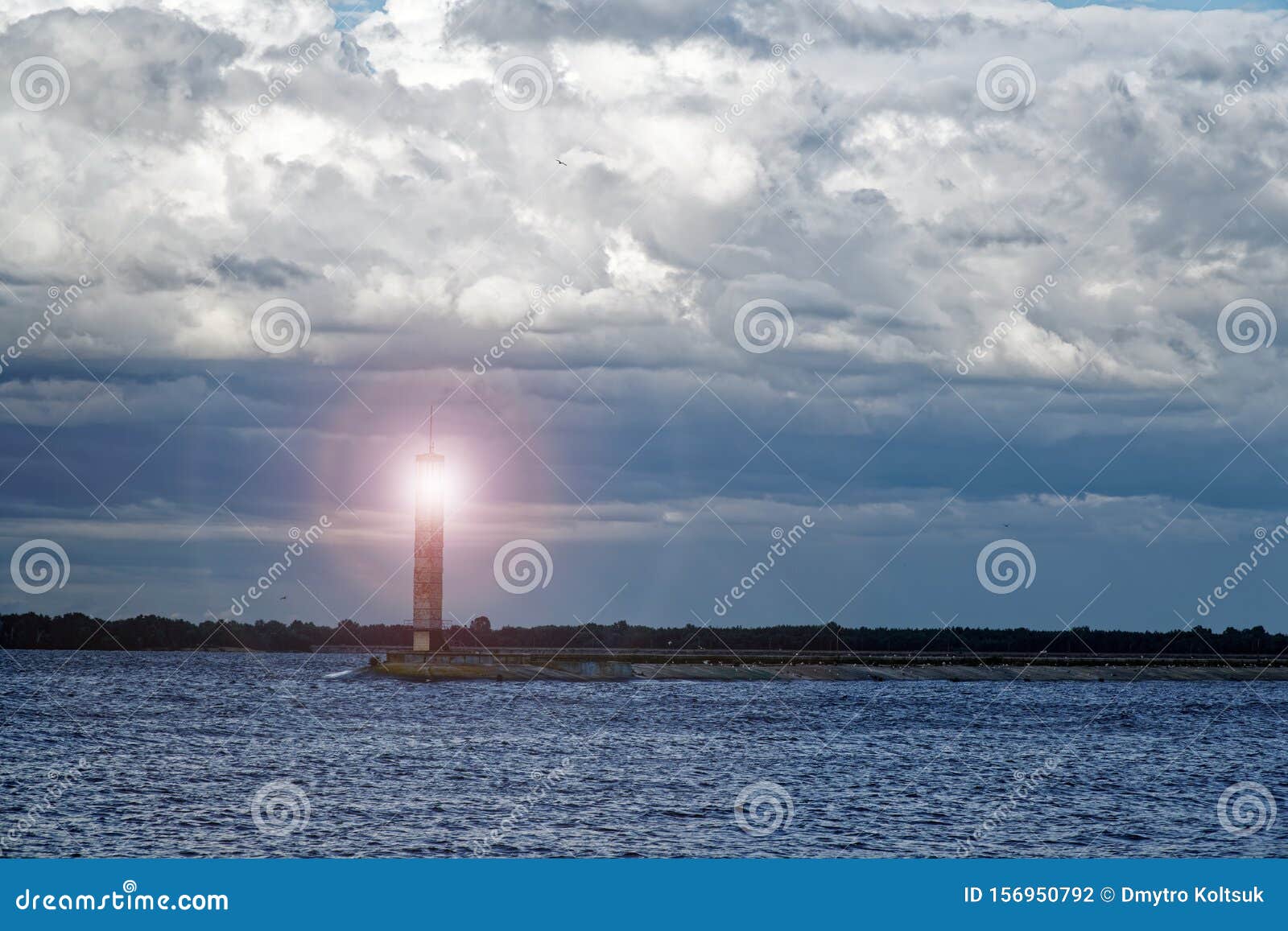Lighthouse or Old Beacon Under Storm Clouds Stock Photo - Image of ...