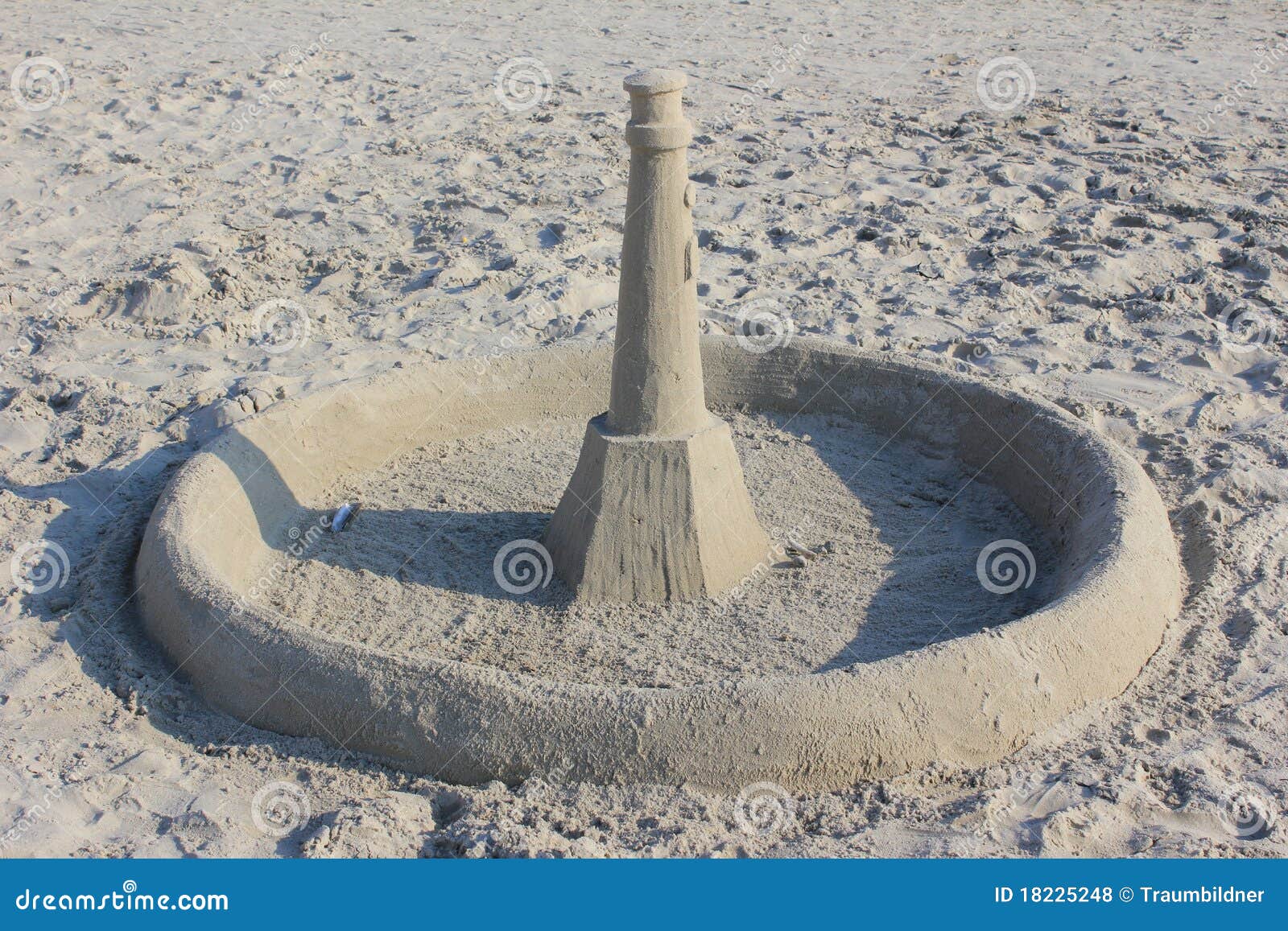 Lighthouse out of sand stock photo. Image of children - 18225248