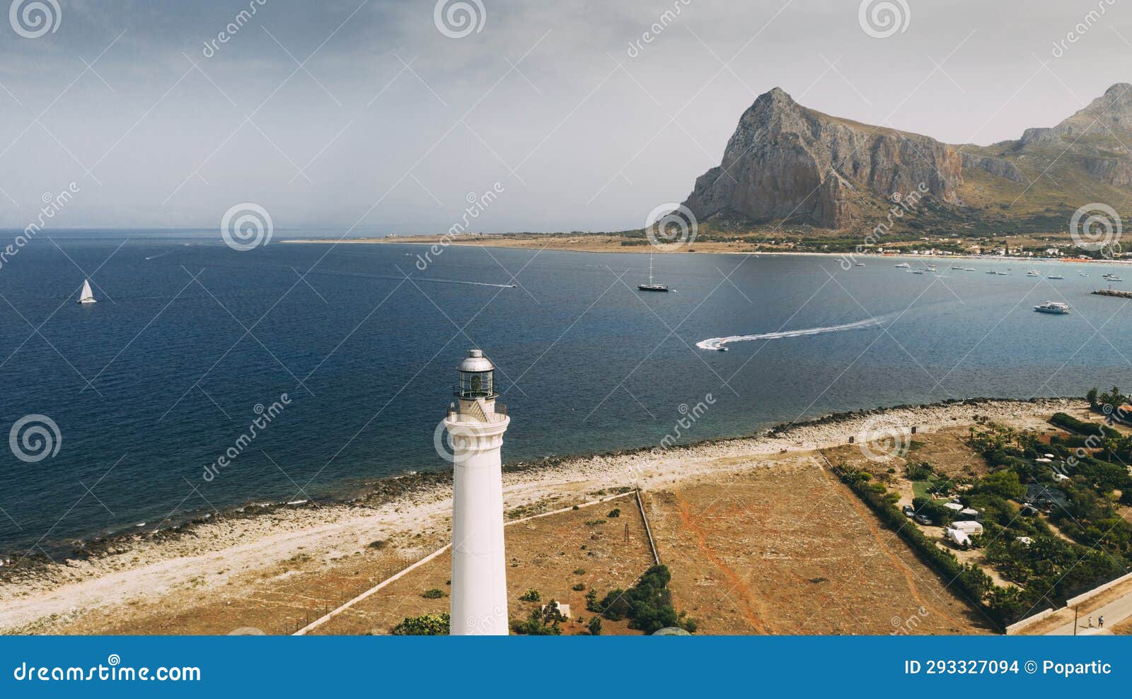 Lighthouse Tower in Front of Bay Stock Photo - Image of blue, island ...