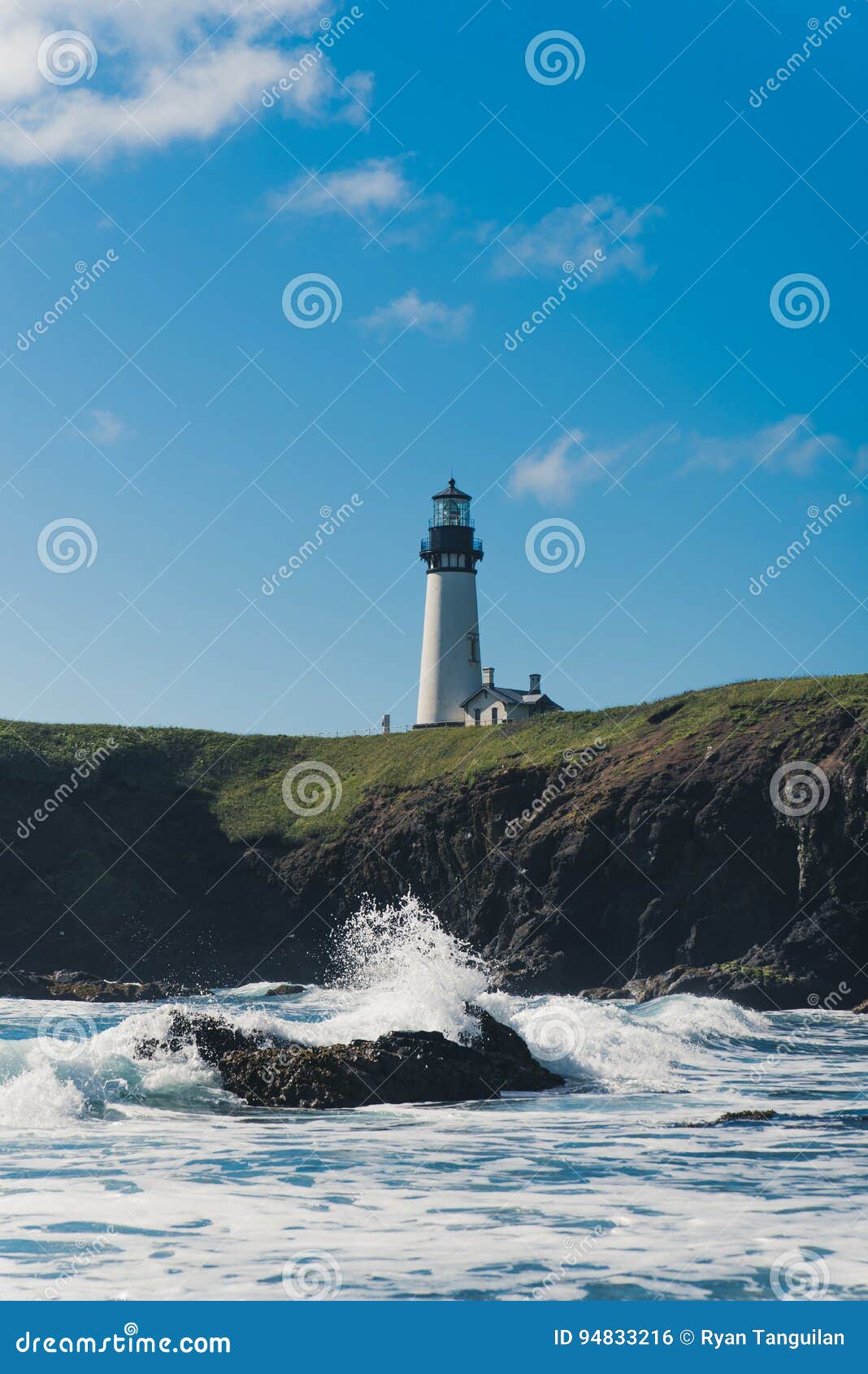 A Lighthouse Overlooking the Ocean. Stock Photo - Image of rocky ...