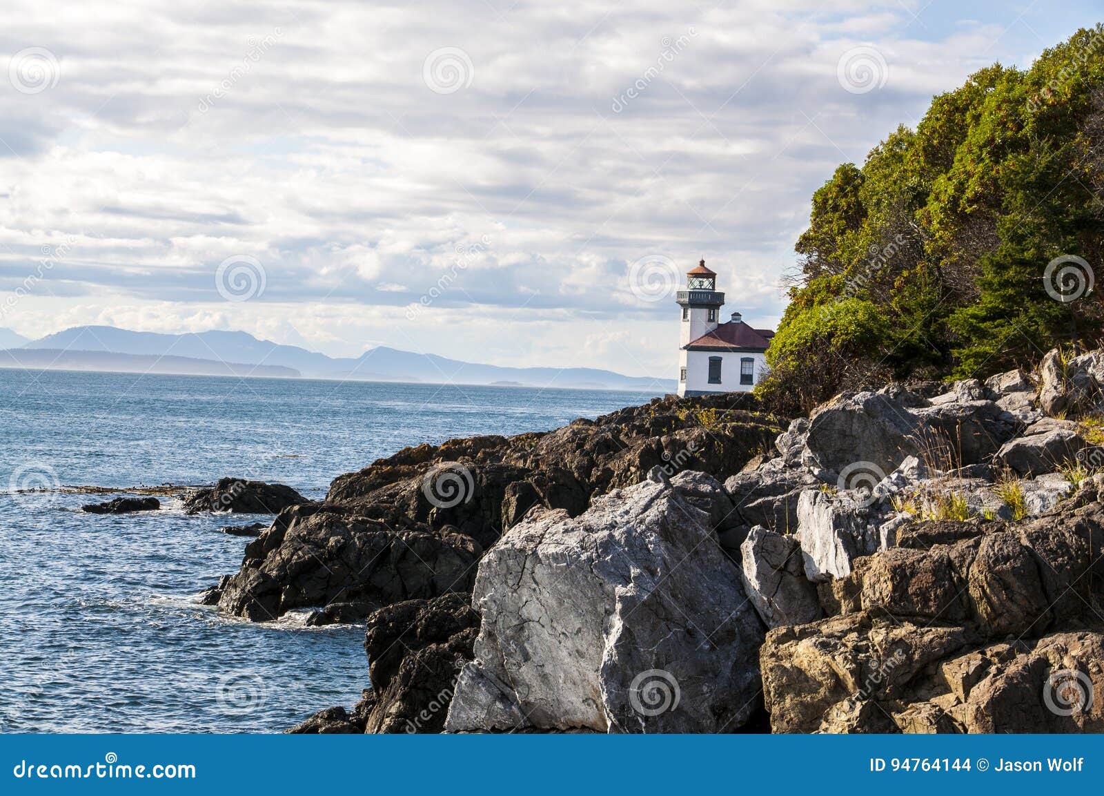 Lighthouse in the Pacific Northwest Stock Photo - Image of clouds ...