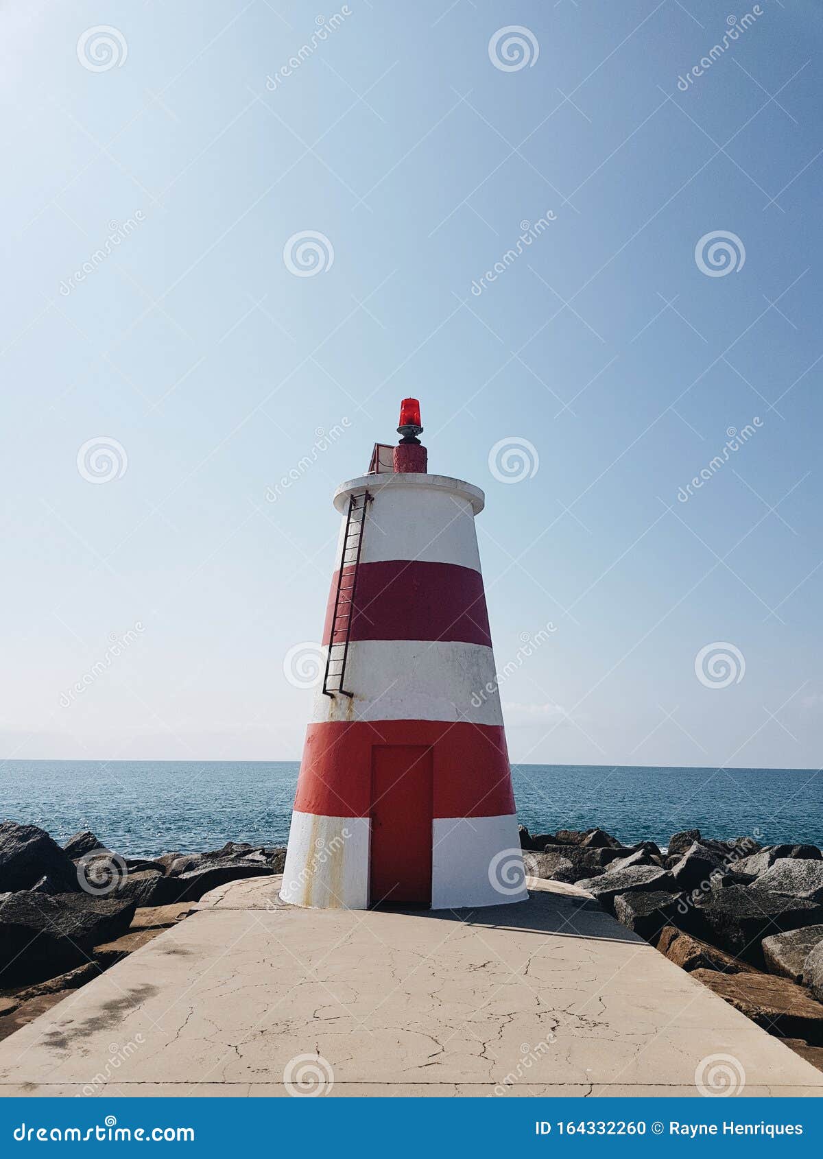 Lighthouse on the pier stock photo. Image of ocean, coastline - 164332260