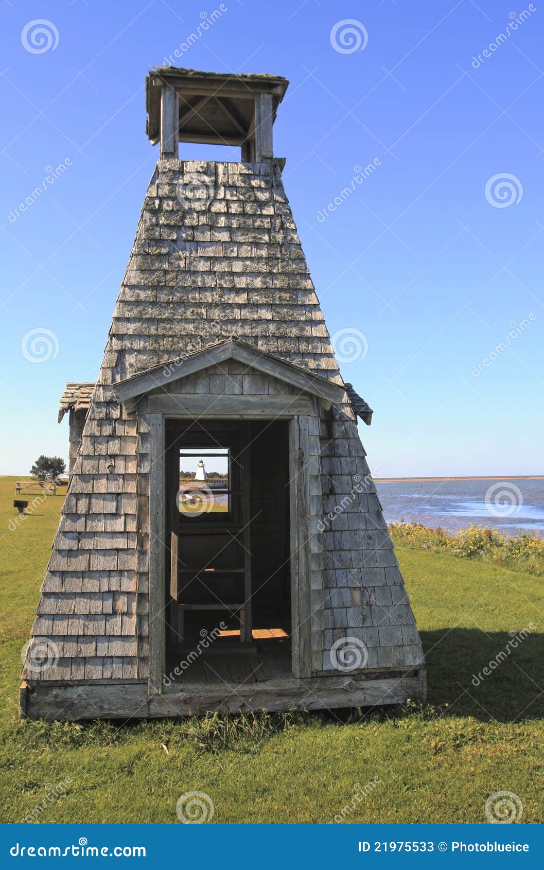 Lighthouse through Playhouse Stock Image - Image of urban, island: 21975533