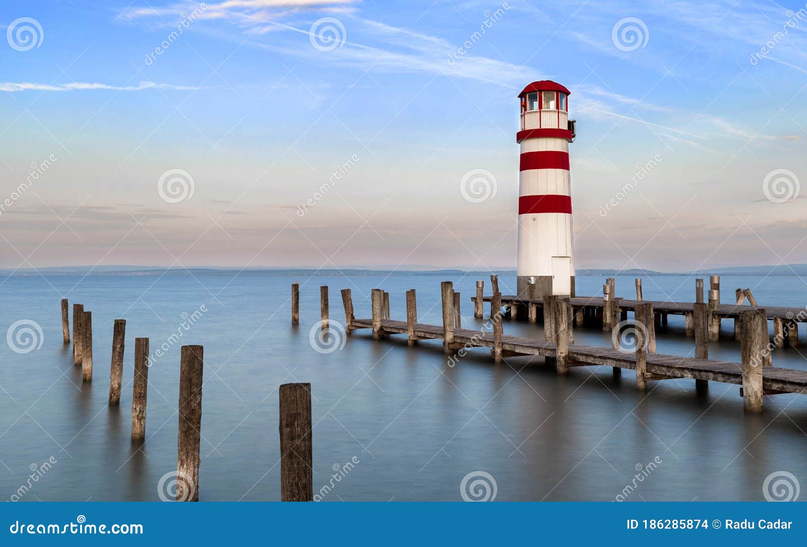 Lighthouse and Ponds at the Lake Stock Photo - Image of evening ...