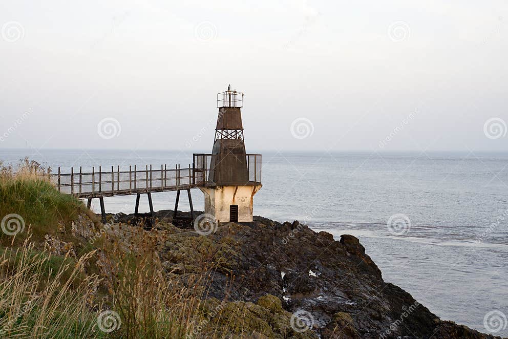 Lighthouse at Portishead stock photo. Image of headland - 1499736