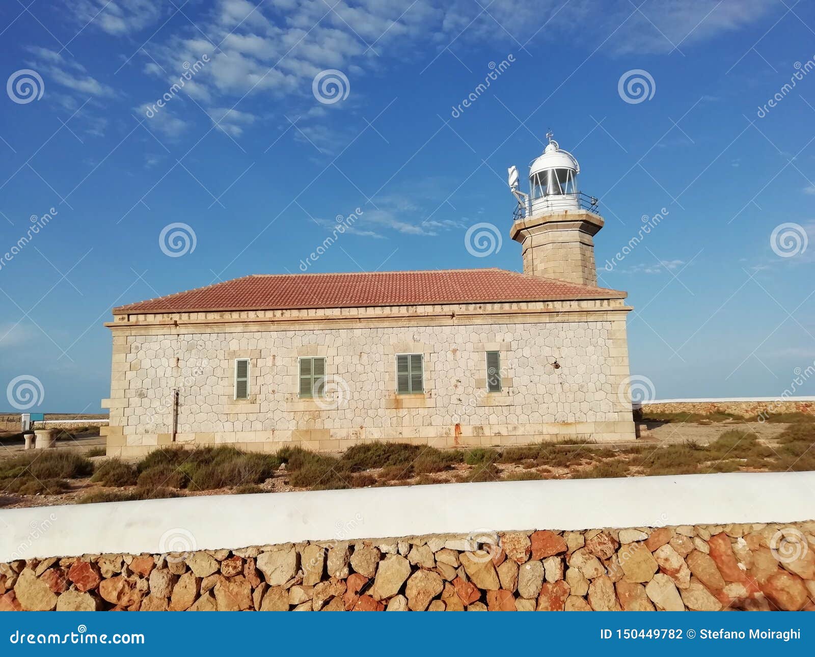 Lighthouse in Punta Nati stock photo. Image of nati - 150449782