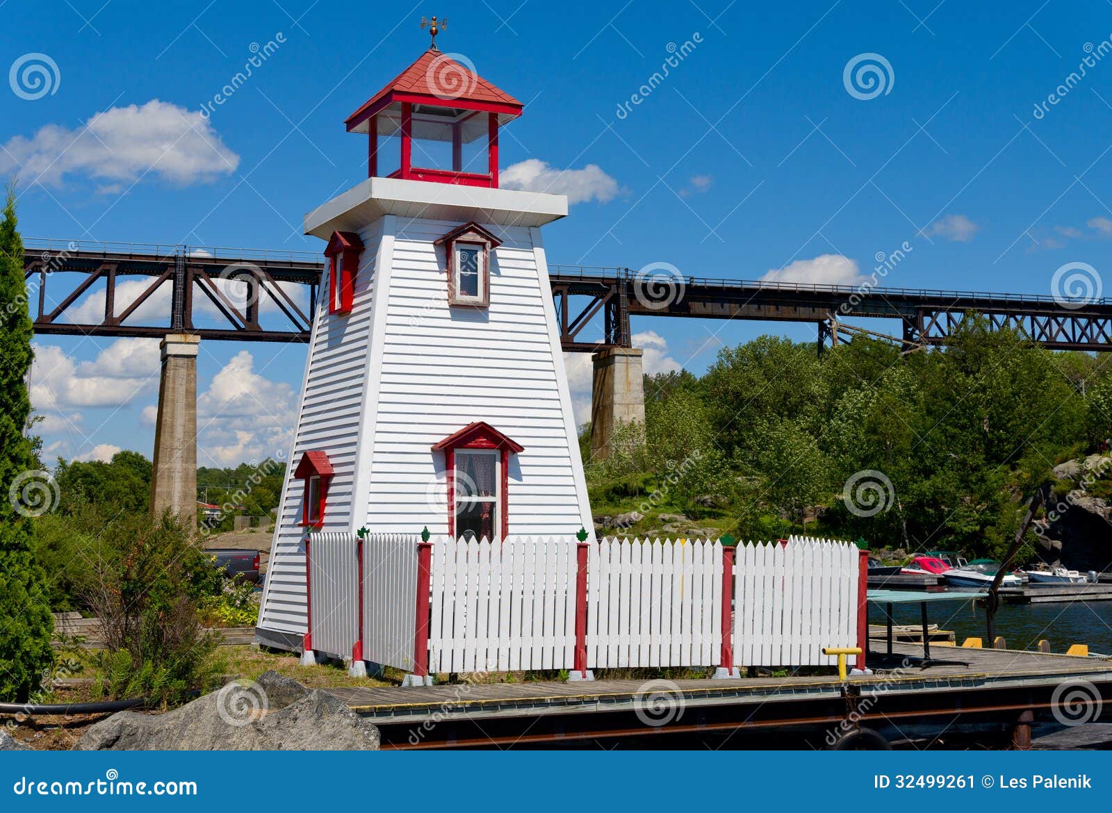 Lighthouse and Railway Bridge Stock Image - Image of boats, picket ...