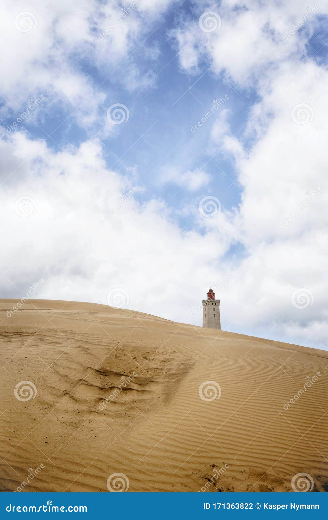 Lighthouse Rising Up Behind a Sand Dune Stock Photo - Image of nature ...