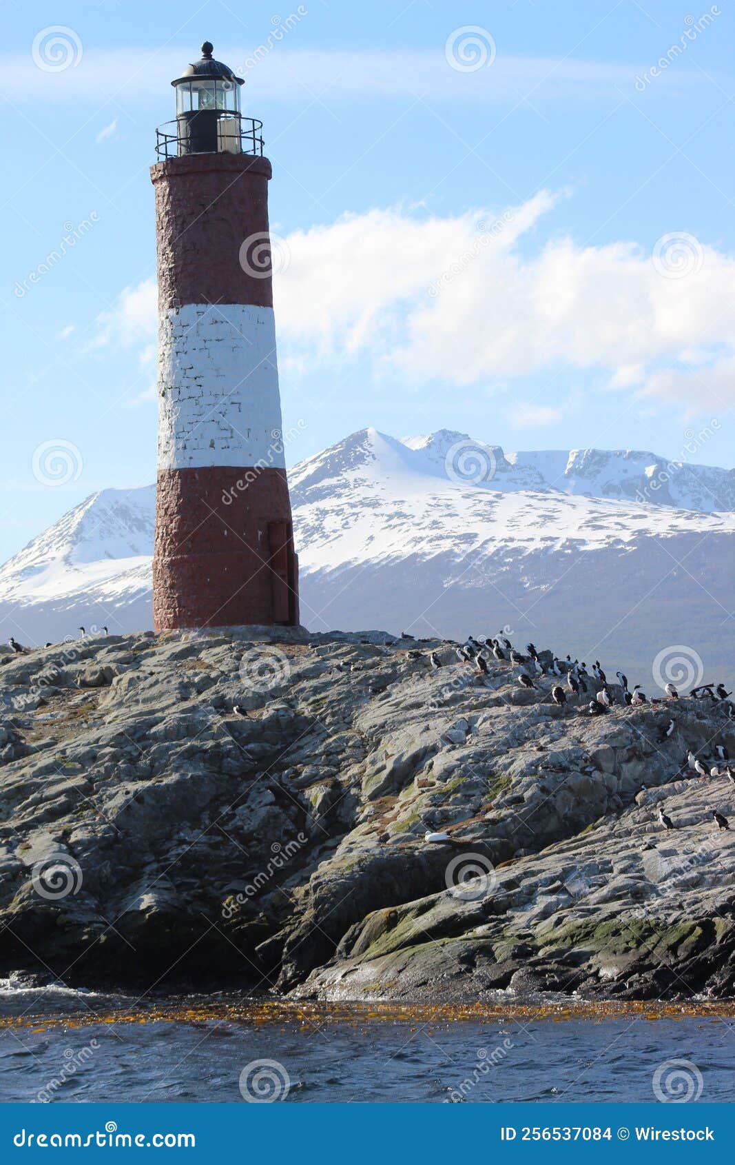 Lighthouse on the Rock Cliff Stock Photo - Image of ocean, stone: 256537084