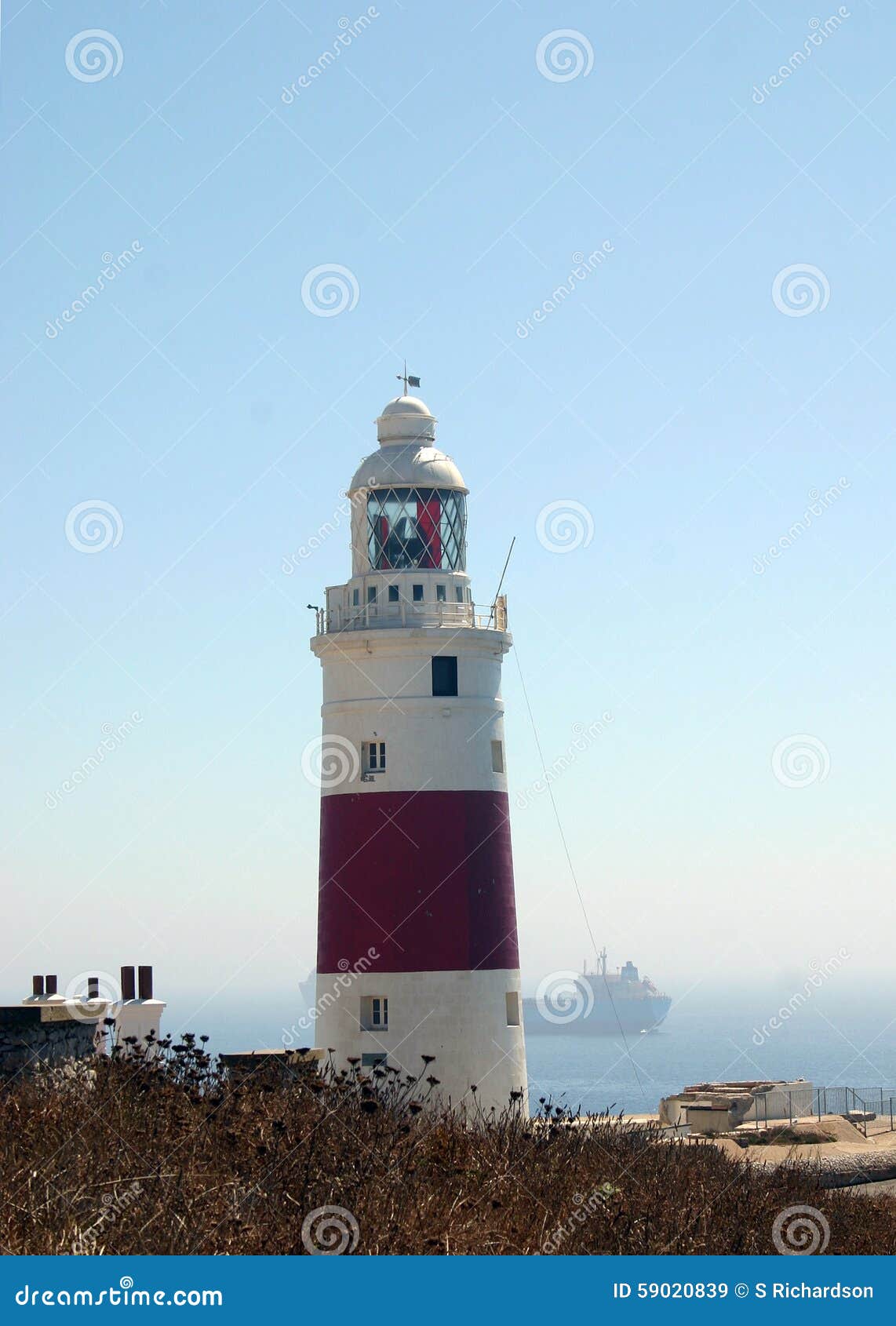 Lighthouse on the rock stock image. Image of warning - 59020839
