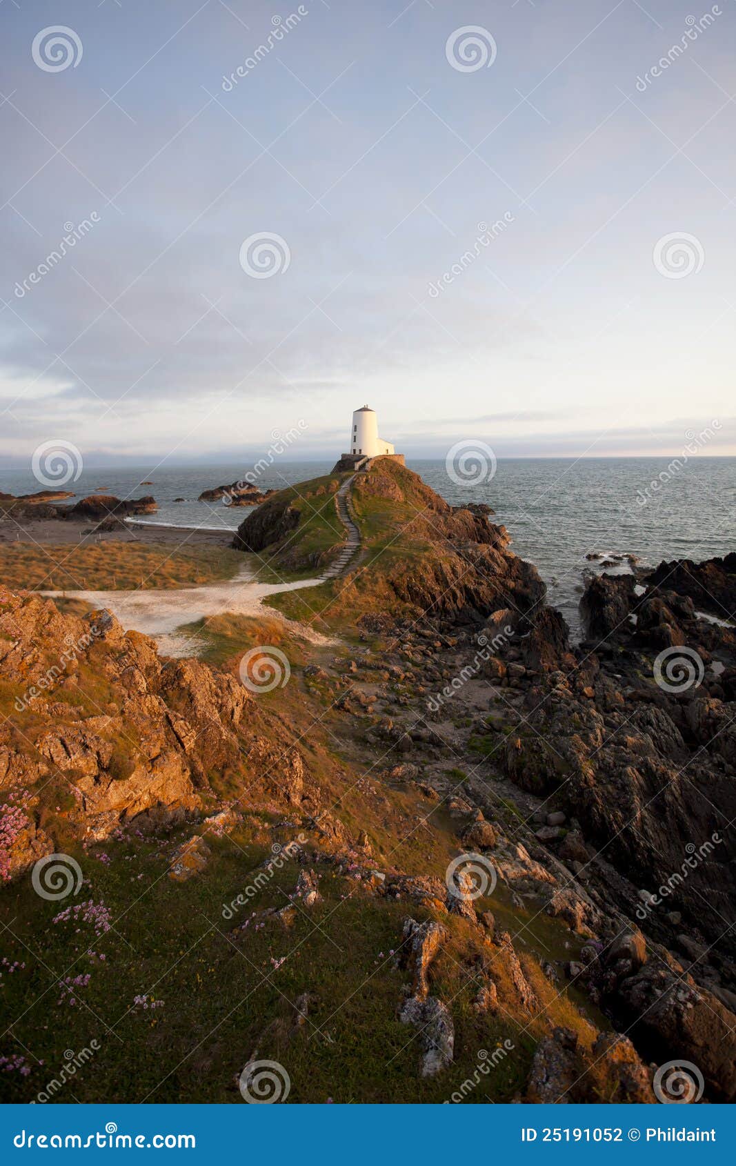 Lighthouse on rocks stock photo. Image of welsh, britain - 25191052