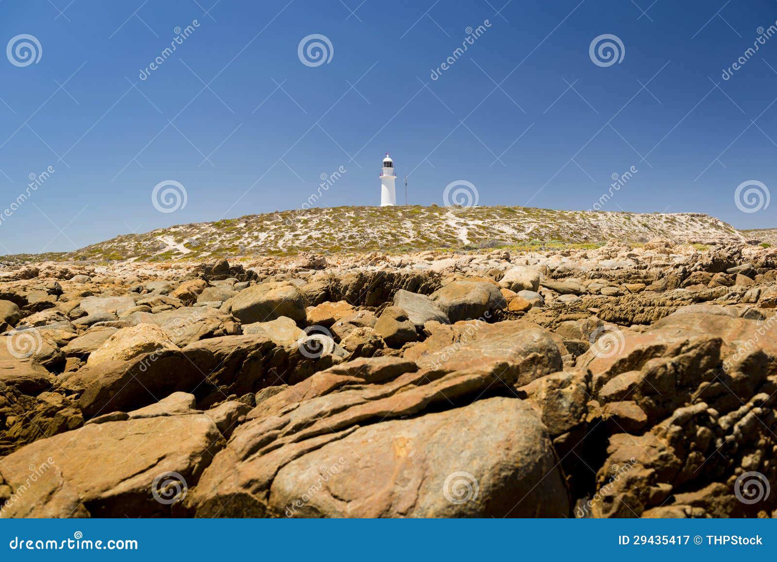 Lighthouse and Rocks stock image. Image of bluff, peace - 29435417