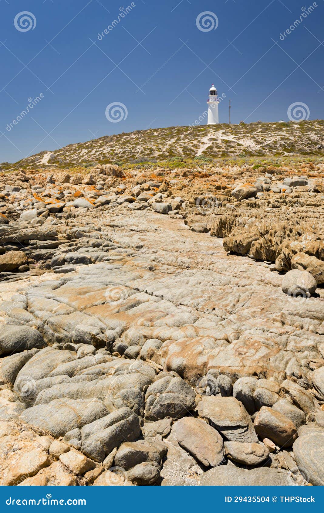 Lighthouse and Rocks stock photo. Image of coastal, landscape - 29435504