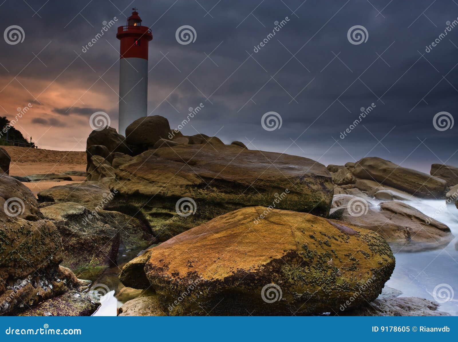 Lighthouse on Rocks stock image. Image of coastline, horizon - 9178605