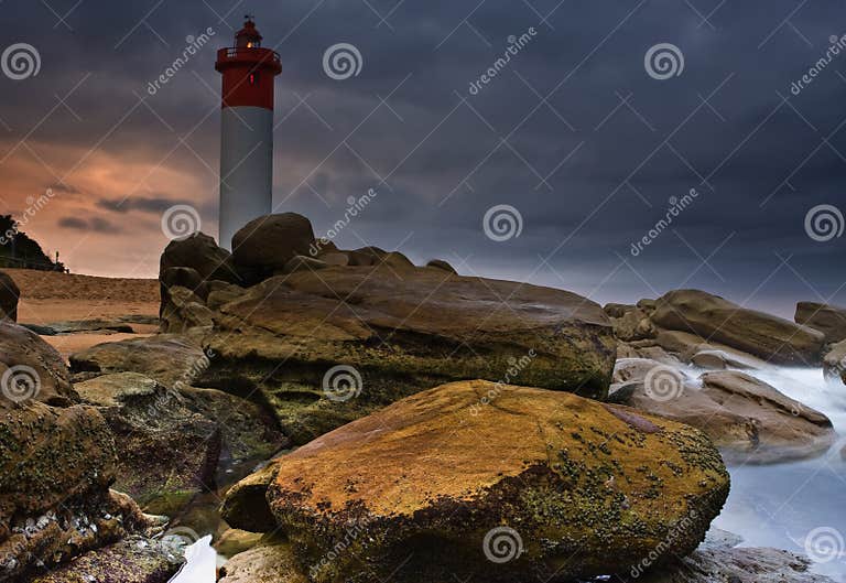 Lighthouse on Rocks stock image. Image of coastline, horizon - 9178605