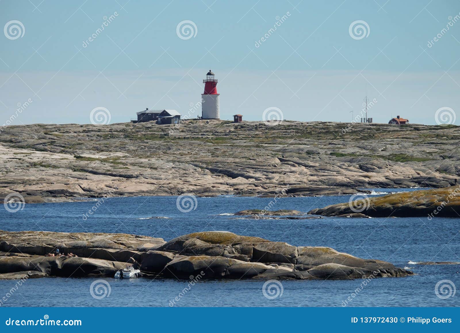 Lighthouse on Rocks Off the Coast Stock Photo - Image of architecture ...